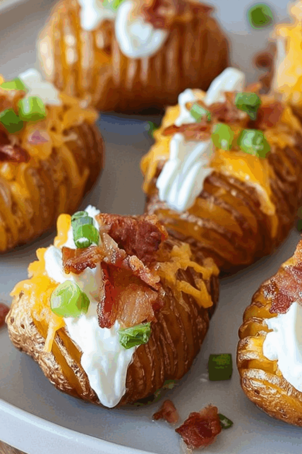 Crispy Loaded Hasselback Potato Bites – Easy Recipe - The Sisters Cooking